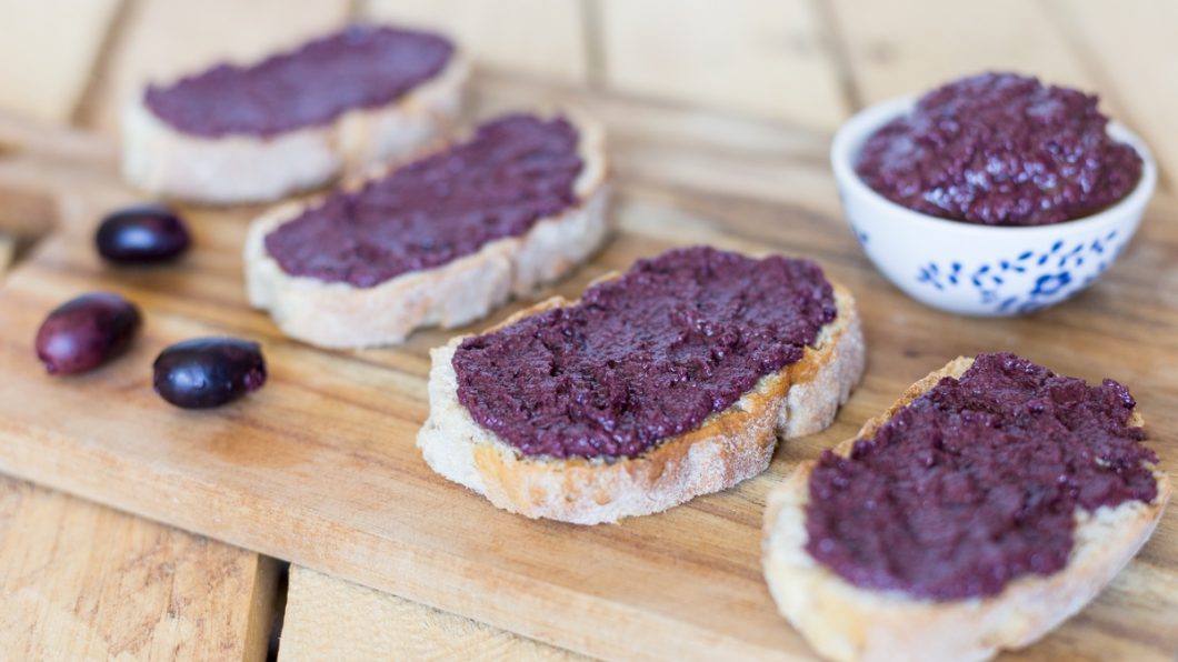 Black olive paté on bruschetta • Electric Blue Food - Kitchen stories ...